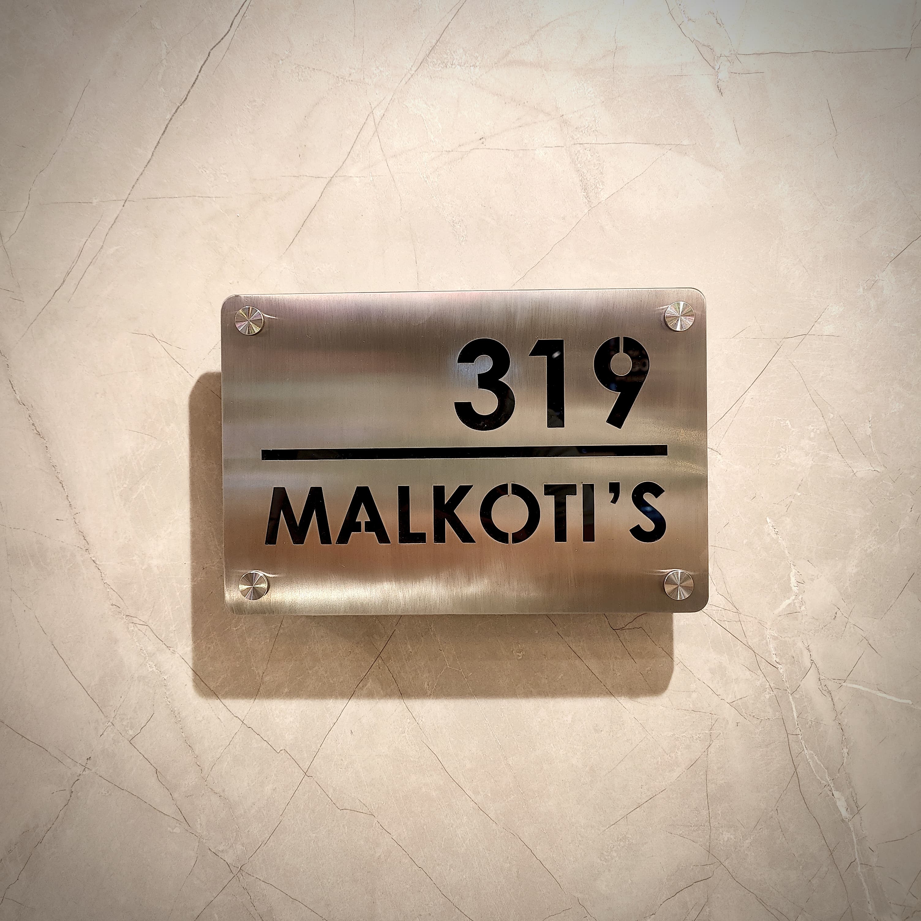 The Futura Steel Nameplate – Nameplate Studio